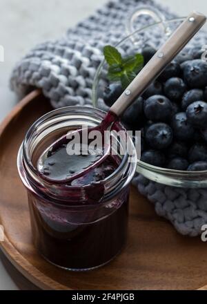 blueberry marmalade next to blueberries Stock Photo - Alamy