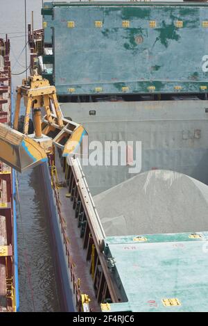 Loading and dischargind operation of bulk cargo bauxite on bulk carrier ship using grab bucket ...
