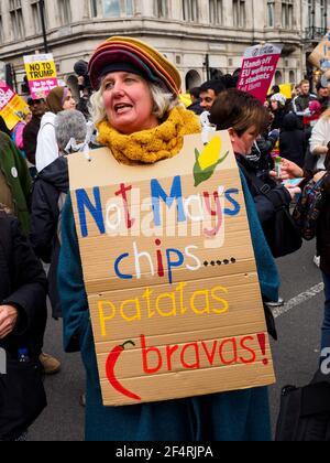 London, UK. 8 March 2017. A woman receives roses. A flashmob takes ...
