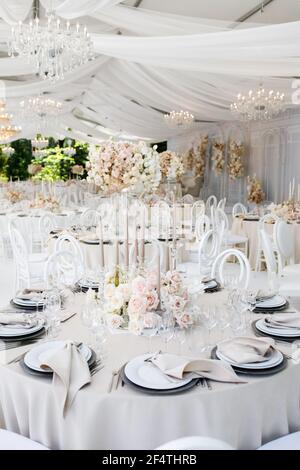 Beautiful table setting with napkins and glasses in stylish room Stock ...