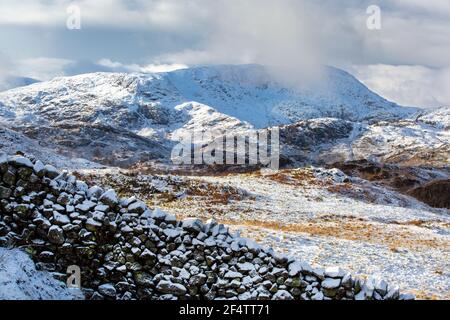 Wetherlam from Black Fell, Lake District, UK with a woman walking Stock ...
