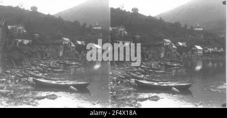 Merok (Norway). Houses and church in the Geiranger fjord Stock Photo ...