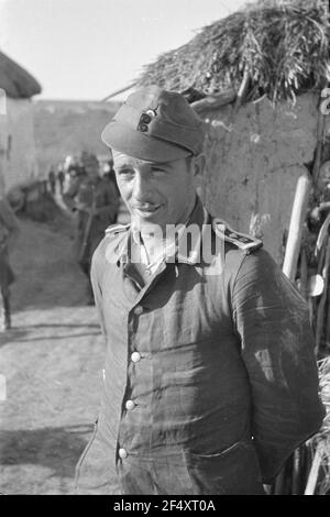 Second World War. For billeting. Soviet Union. On a hillside man in ...