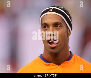Ronaldinho looks out into the crowd before the game. FC Barcelona ...