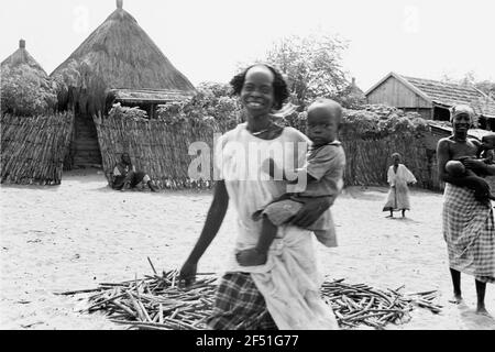 Travel photos Senegal. Huts of the village and locals. View with two ...