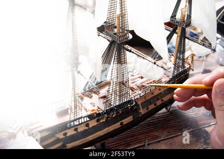 Model Ship Building handcraft on table with different materials Stock ...