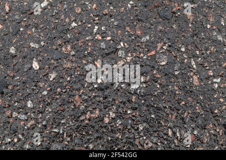 Closeup of red tarmac background. Texture of a tarmac road Stock Photo ...