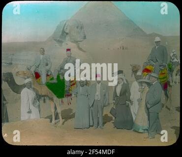 Giza (Egypt). Tourists and native leaders with camels in front of the ...