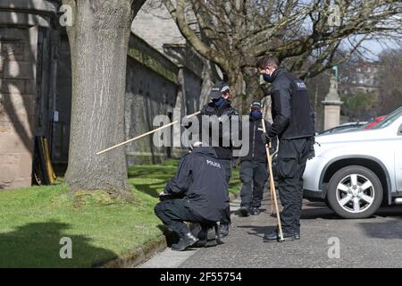 Police officers conduct a search outside the Palace of Holyroodhouse in ...