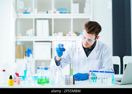 Male scientist working in laboratory Stock Photo - Alamy