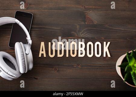 audiobook word text concept modern wireless headphones smartphone Stock ...