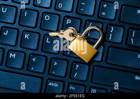 Computer protection concept, internet security. Lock on keyboard laptop ...