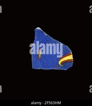 This glass mosaic fragment with striped patterns reflects advanced ...