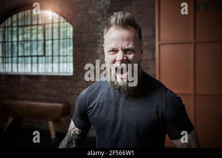 Screaming Fitness Instructor Stock Photo - Alamy