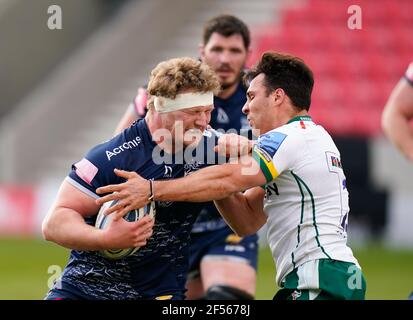 Sale Sharks Ross Harrison leads with his arm into London Irish Nick ...