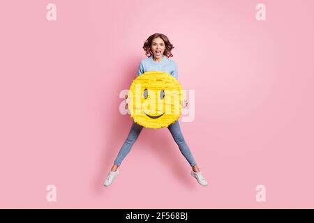 Happy emoji emoticon jumping in the air Stock Photo - Alamy