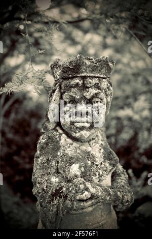 Moss covered statues at Greenwood Gardens in Millburn, NJ, USA. These ...
