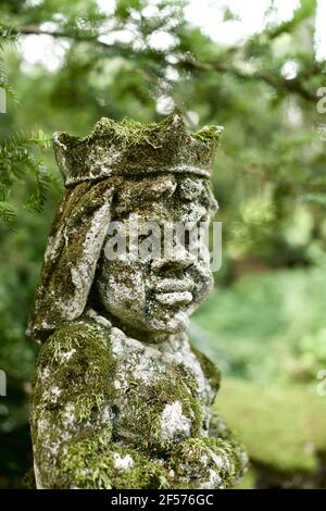 Moss covered statues at Greenwood Gardens in Millburn, NJ, USA. These ...