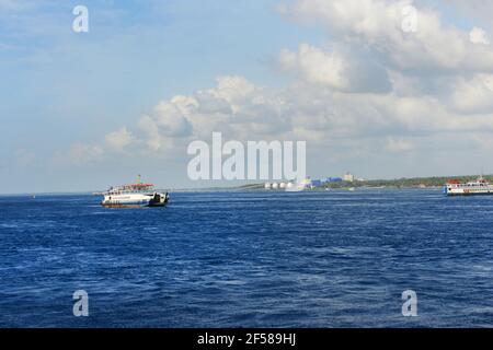 Ships crossing the Bali strait between the islands of Bali and Java in ...