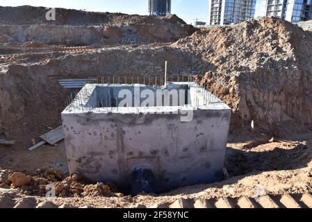 Construction of concrete stormwater pits, sanitary sewer system ...