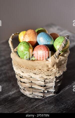 Colored eggs and paint on a wooden table, Easter background Stock Photo ...