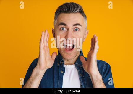 Surprise man isolated on yellow background. Handsome Black Man with ...