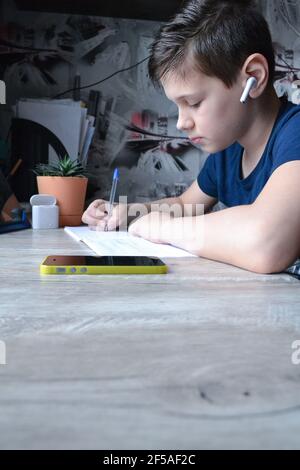 Boy doing math homework Stock Photo - Alamy