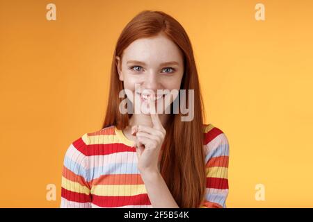 Flirty devious creative young redhead smiling excited ginger girl ...