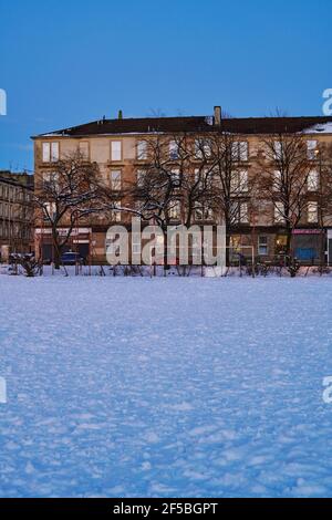 Glasgow tenements at dusk with winter snow lying Stock Photo - Alamy