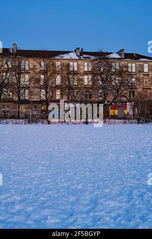 Glasgow tenements at dusk with winter snow lying Stock Photo - Alamy