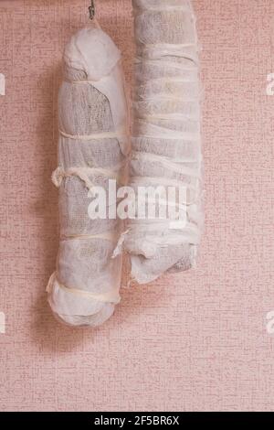 Pork loin, polendwitz wrapped in gauze and hung for drying Stock Photo ...