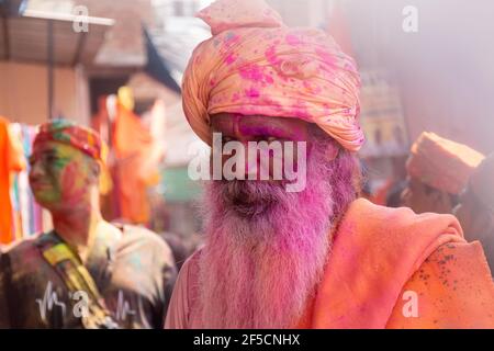 Festival of holi, friendship, happiness and holidays concept - little ...