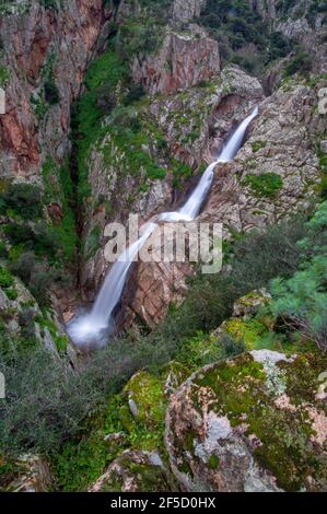 waterfall of sa spendula and water flows through the rocks, Villacidro ...