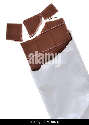 broken in paper and foil packaging milk chocolate bar made from cocoa ...