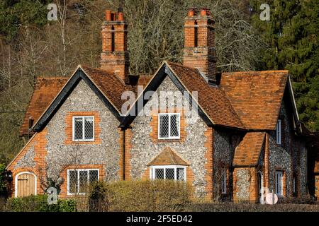 Typical gable fronted brick & flint house and willow tree by the River ...
