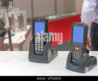 Handheld Computer Barcode Scanner Device at Charging Station Dock Stock ...