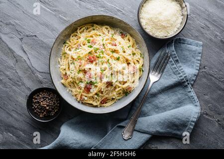 Italian classic spaghetti carbonara with fried bacon and egg Stock ...