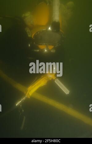 Former Soviet submarine Juliett 484 breaks the surface of the ...