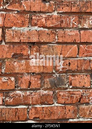 The texture of the brick wall of many rows of bricks painted in blue ...