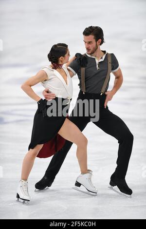 Laurence Fournier Beaudry and Nikolaj Sorensen, of Denmark, compete ...