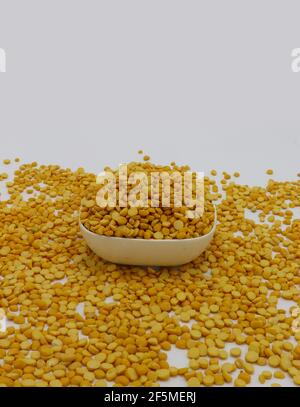 chickpea Also Know as Chana Daal in a white white little bowl isolated ...