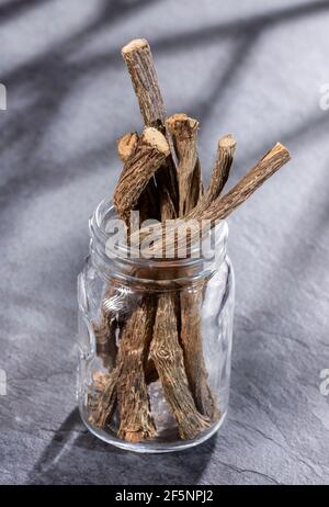 Dried stems of medicinal valerian in the glass jar - Valeriana ...