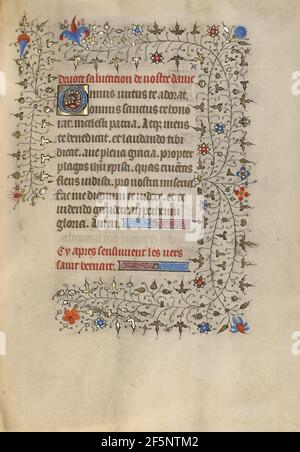 A historical manuscript features intricate text organized in a ...