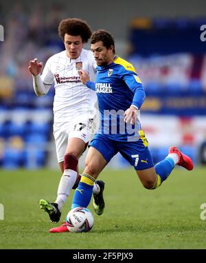 Northampton Town's Shaun McWilliams (left), Ricky Korboa and goalkeeper ...