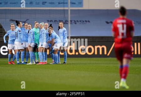 Manchester City players huddle before the Premier League match at ...