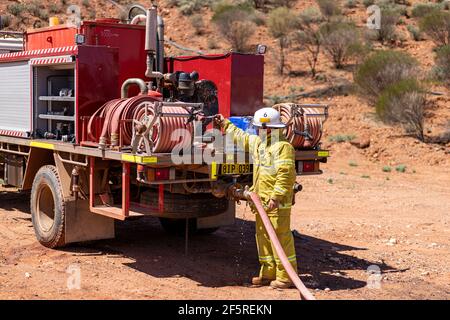 Mine Emergency Response Team in protective clothing and breathing ...