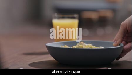 put seasoning fettuccine in white bowl on linen cloth, wide photo Stock ...