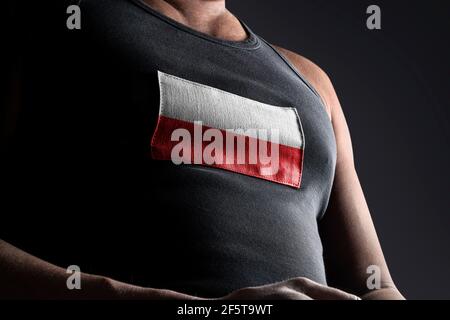 The national flag of Poland on the athlete's chest Stock Photo - Alamy