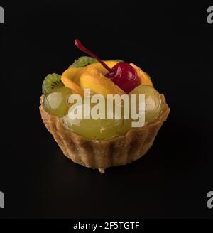 Tart with mango, biscuit chocolate mousse and whipped cream Stock Photo ...