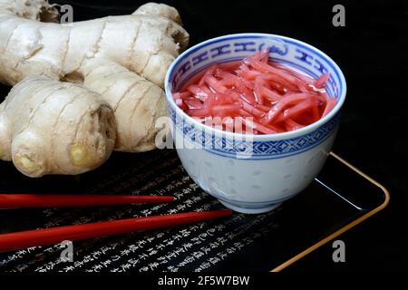 Pickled ginger in small bowls and ginger root, Germany Stock Photo - Alamy